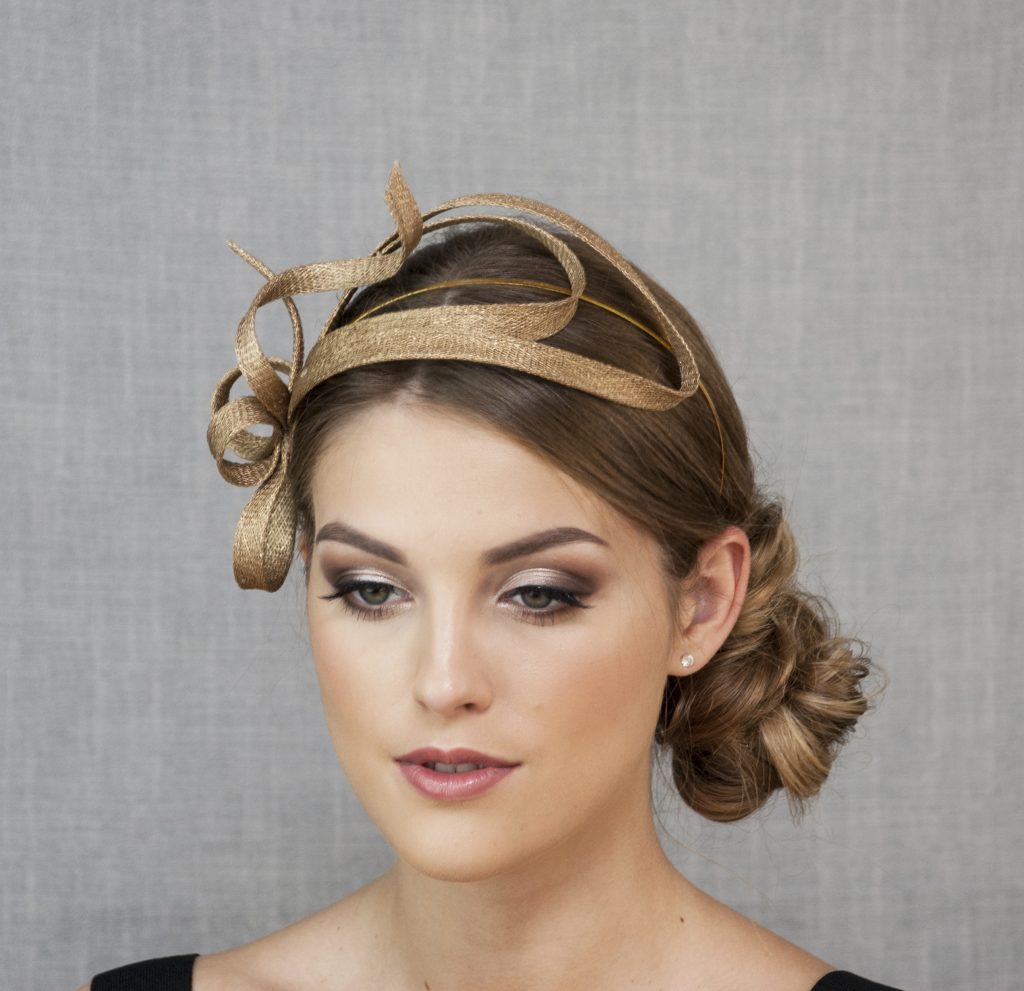 Marge Iilane - Modern golden fascinator.
