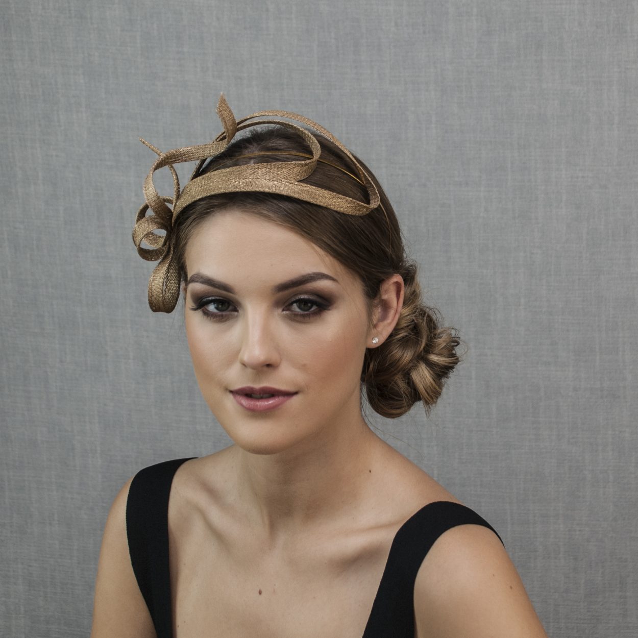Marge Iilane - Modern golden fascinator.