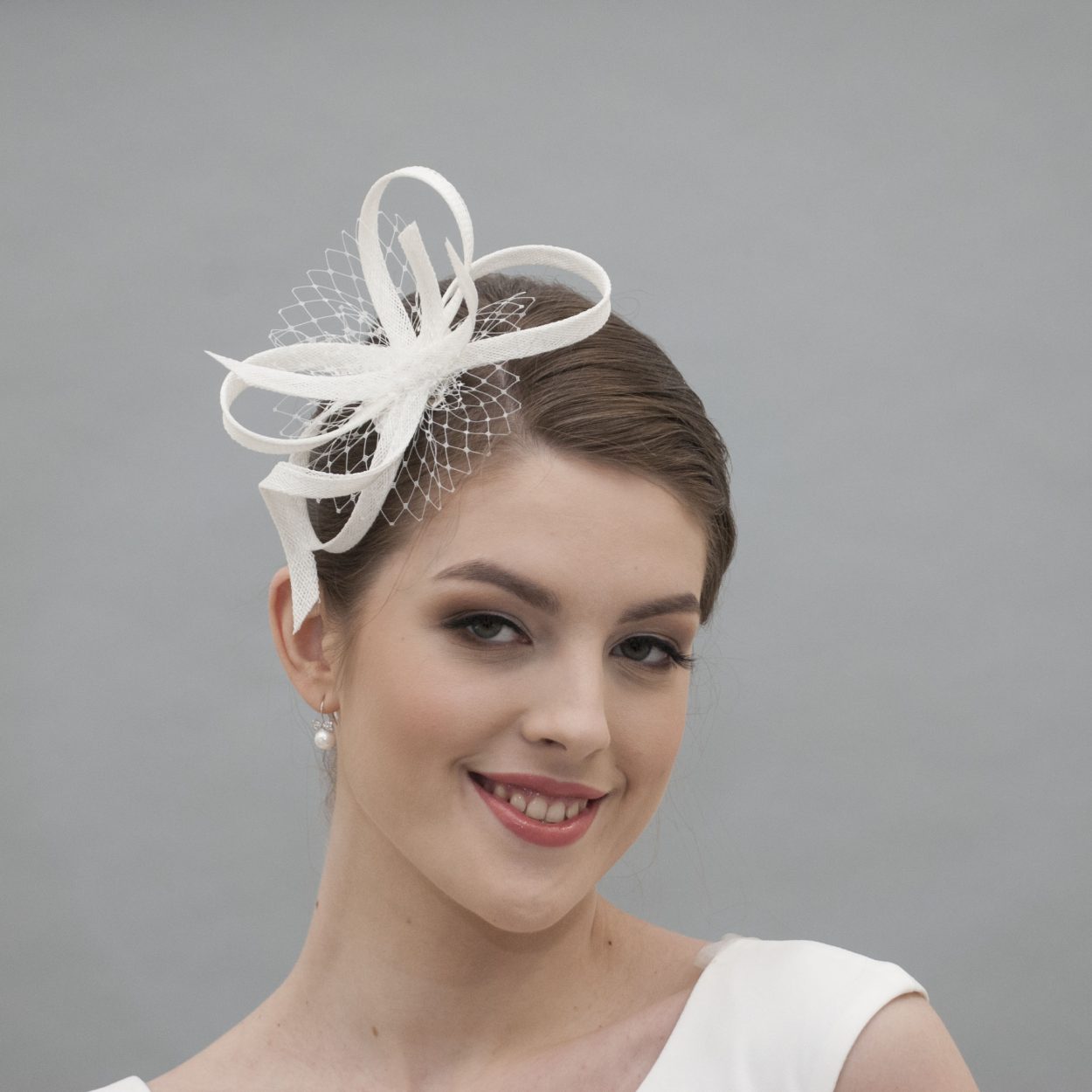 Marge Iilane - White modern wedding fascinator. Bridal fascinator.