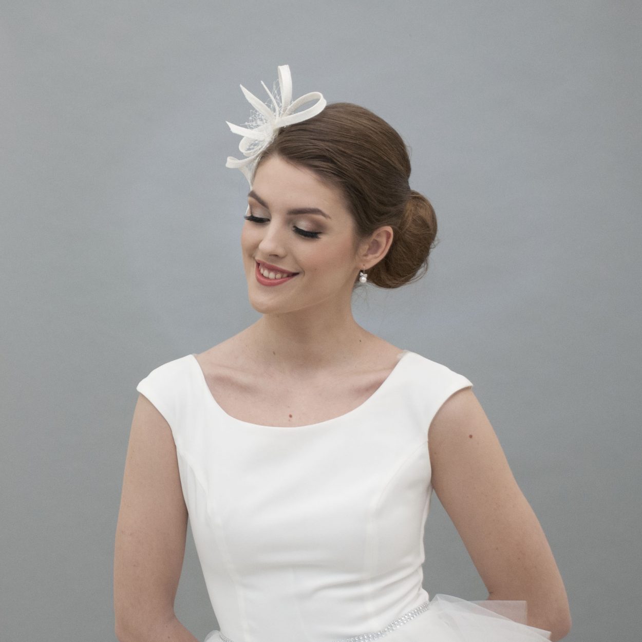 Marge Iilane - White modern wedding fascinator. Bridal fascinator.